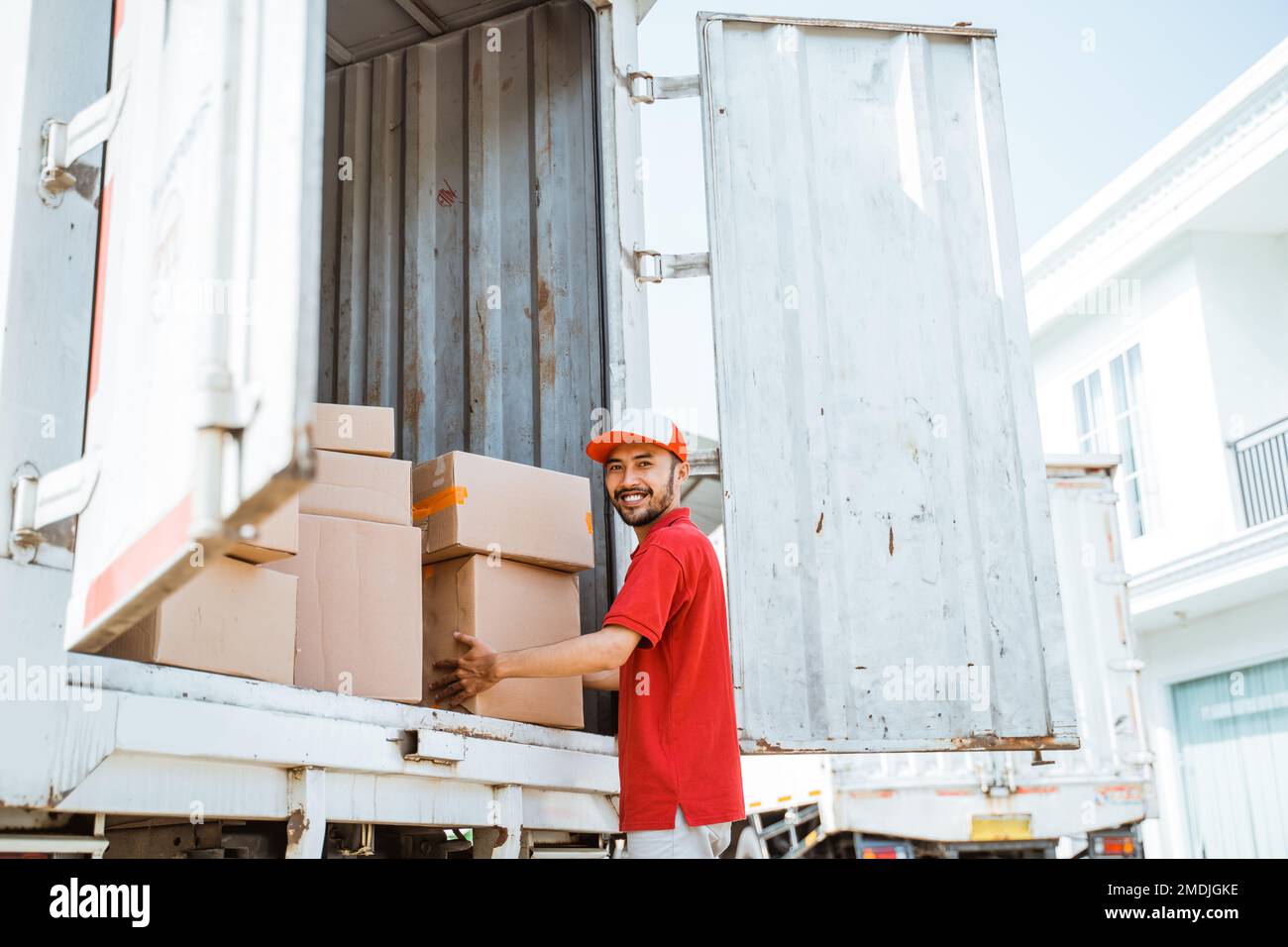 Employee delivery service taking boxes hi-res stock photography and ...