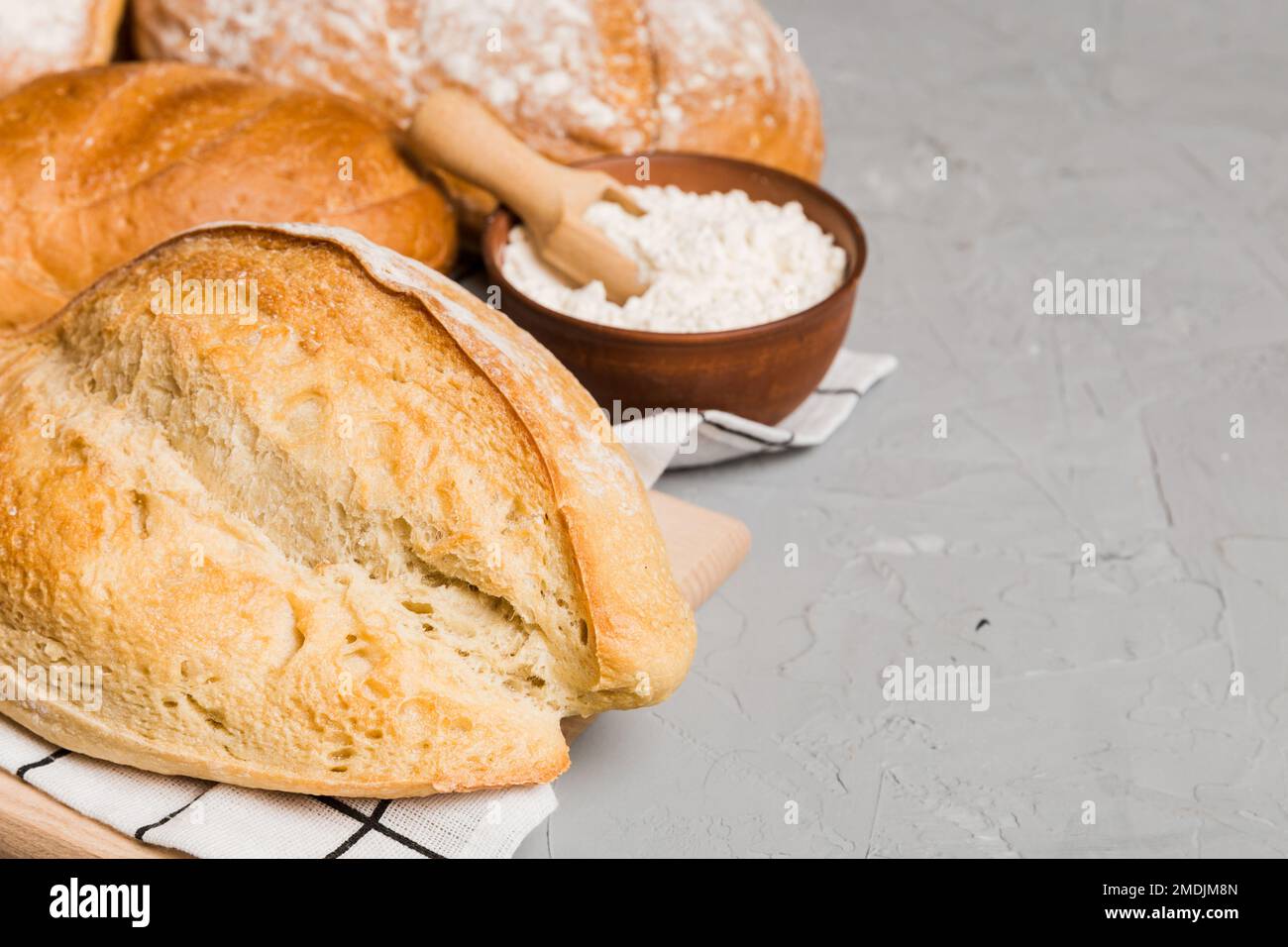 Homemade natural breads. Different kinds of fresh bread as background ...
