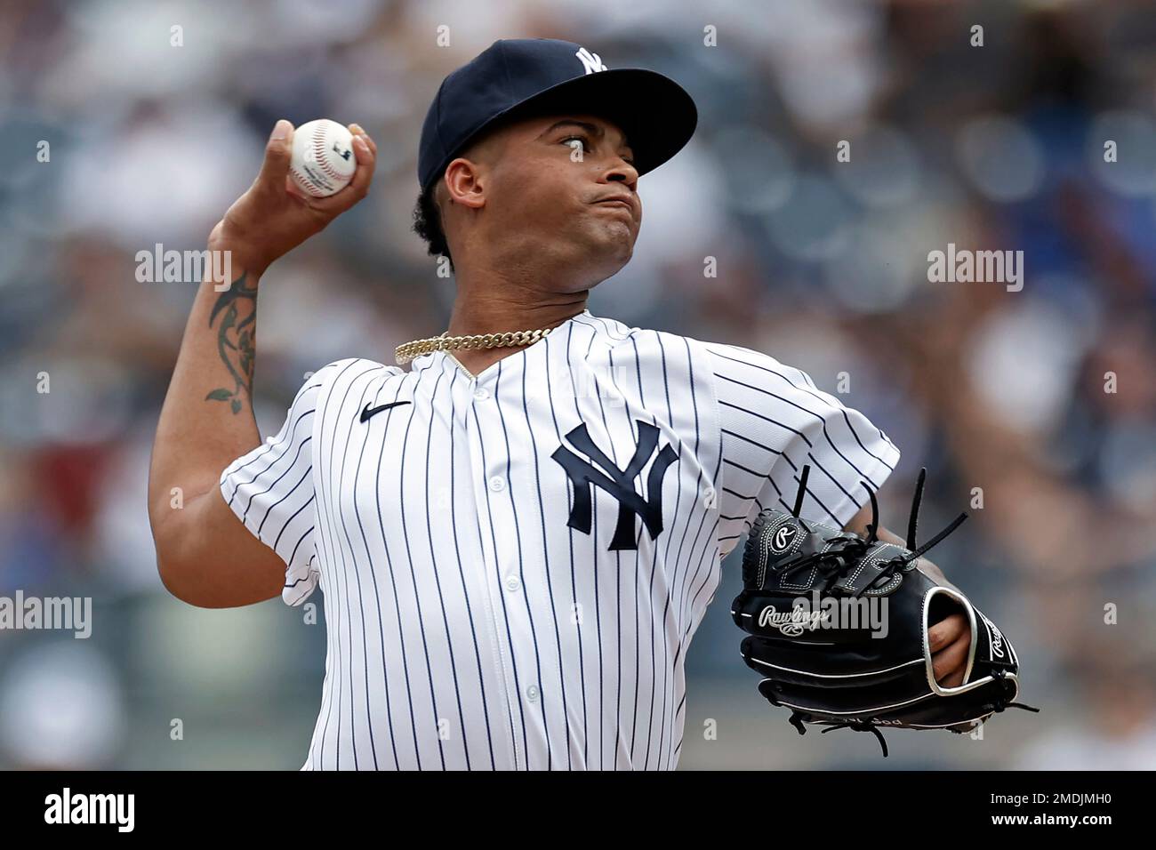 New York Yankees pitcher Luis Gil delivers to the Minnesota Twins ...