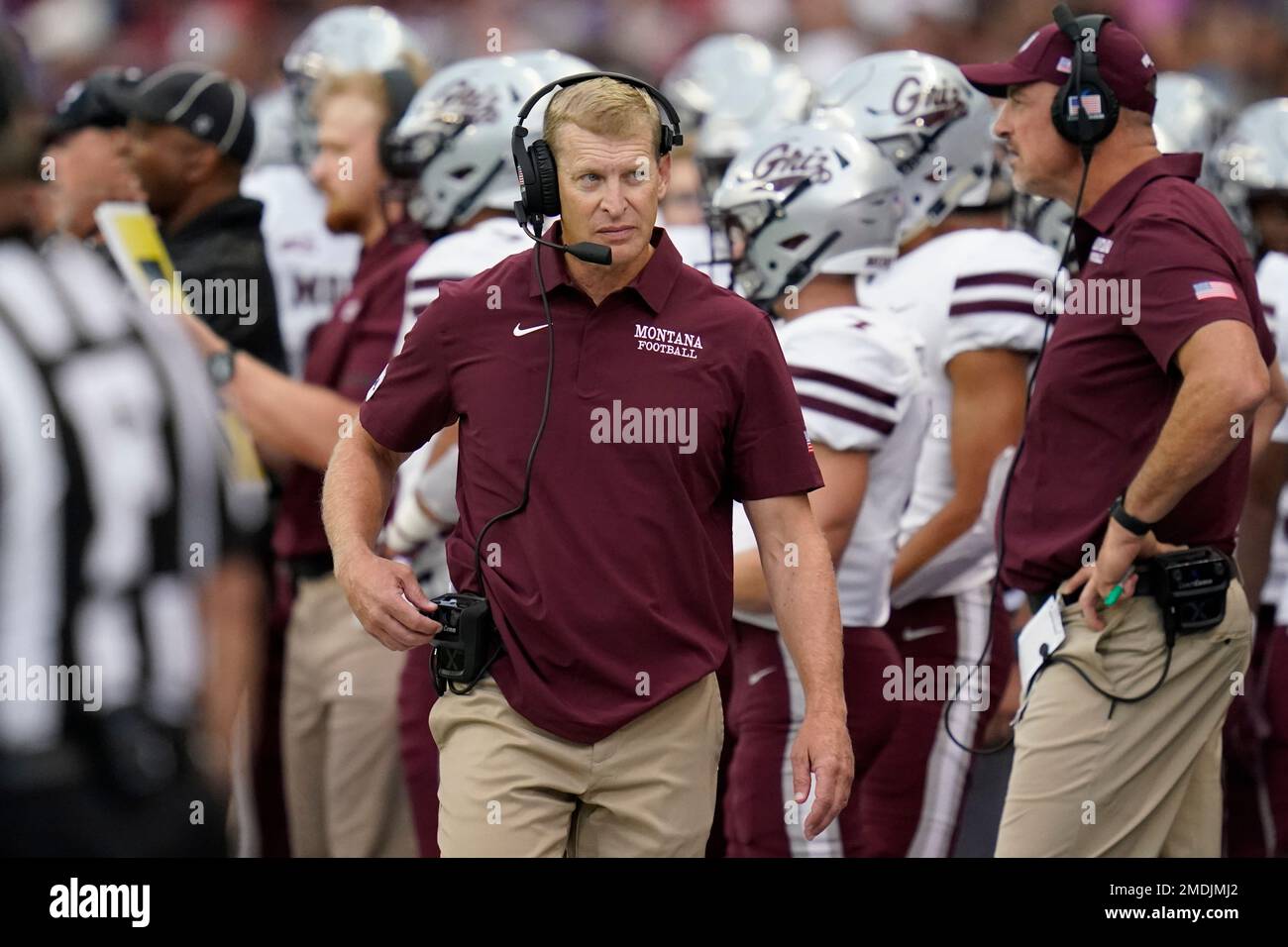 Montana head coach Bobby Hauck walks along the sideline during an NCAA ...