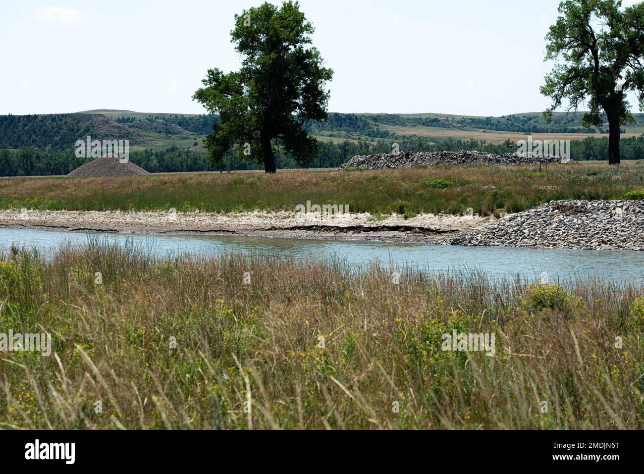 Water flows through the new bypass channel on the Lower Yellowstone ...