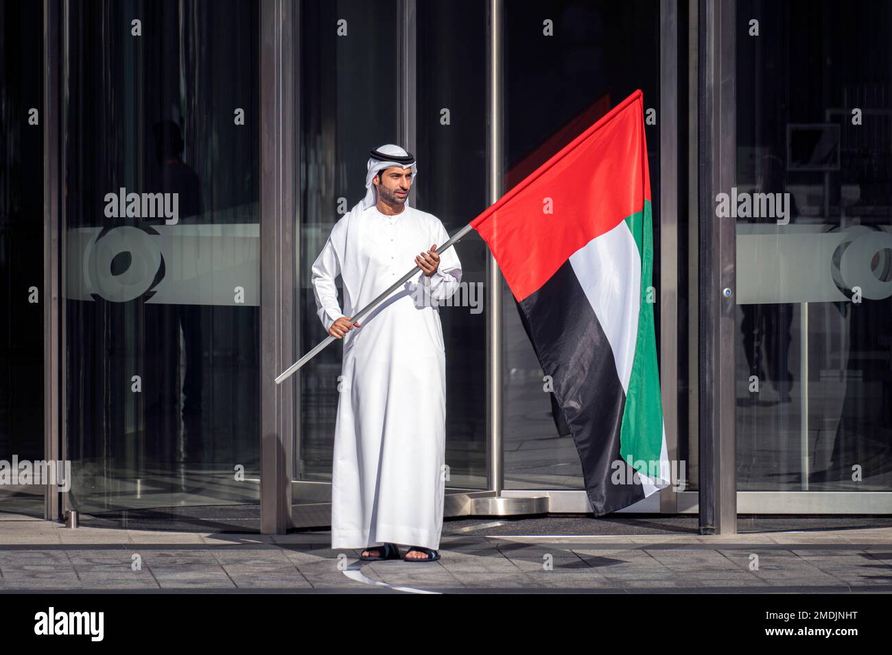 Dubai, UAE - November 28, 2022: Arab man with a traditional white shirt ...