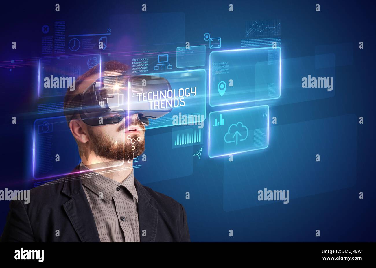 Businessman looking through Virtual Reality glasses, tech concept Stock ...