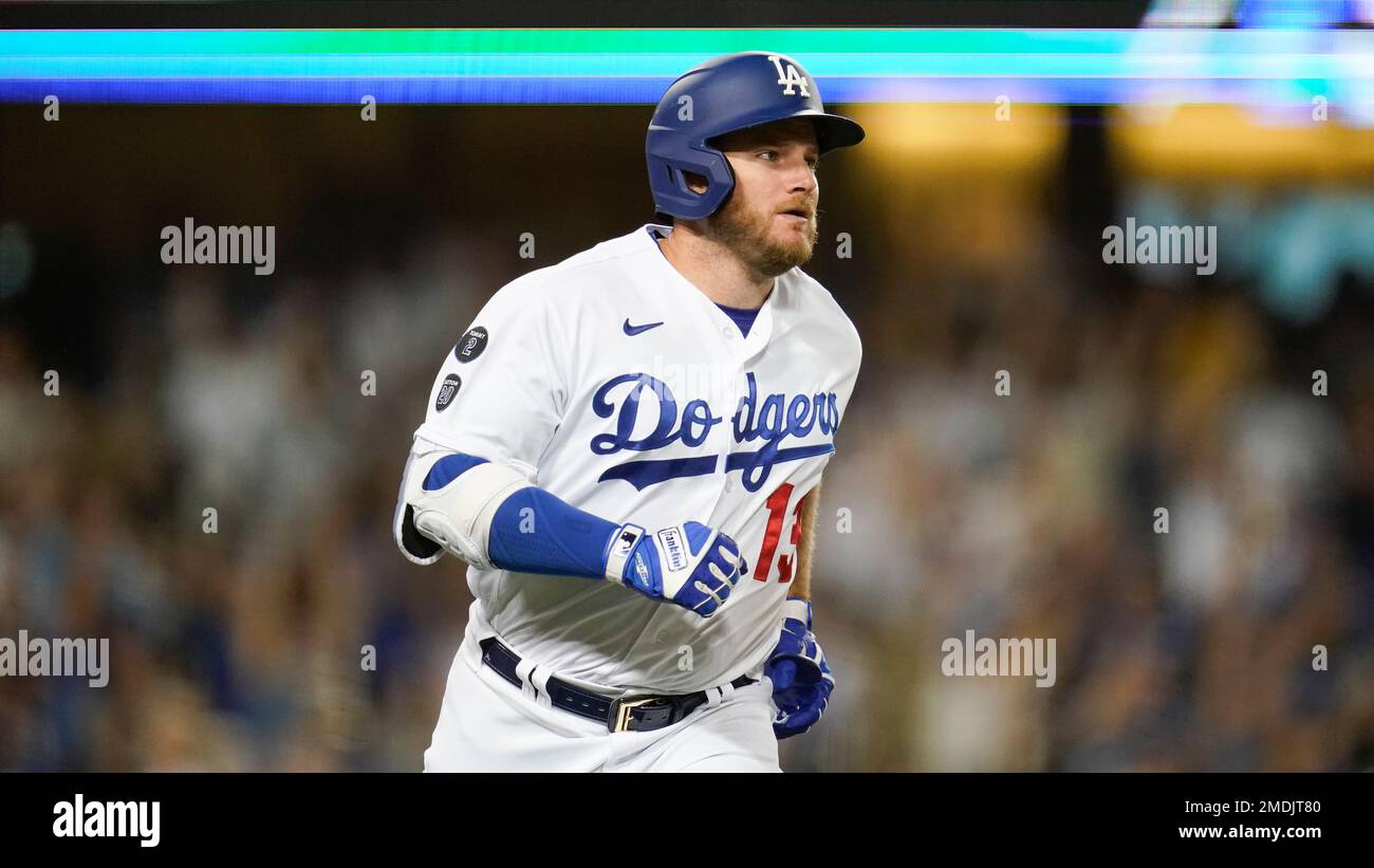 Los Angeles Dodgers' Max Muncy runs to first base during a baseball ...