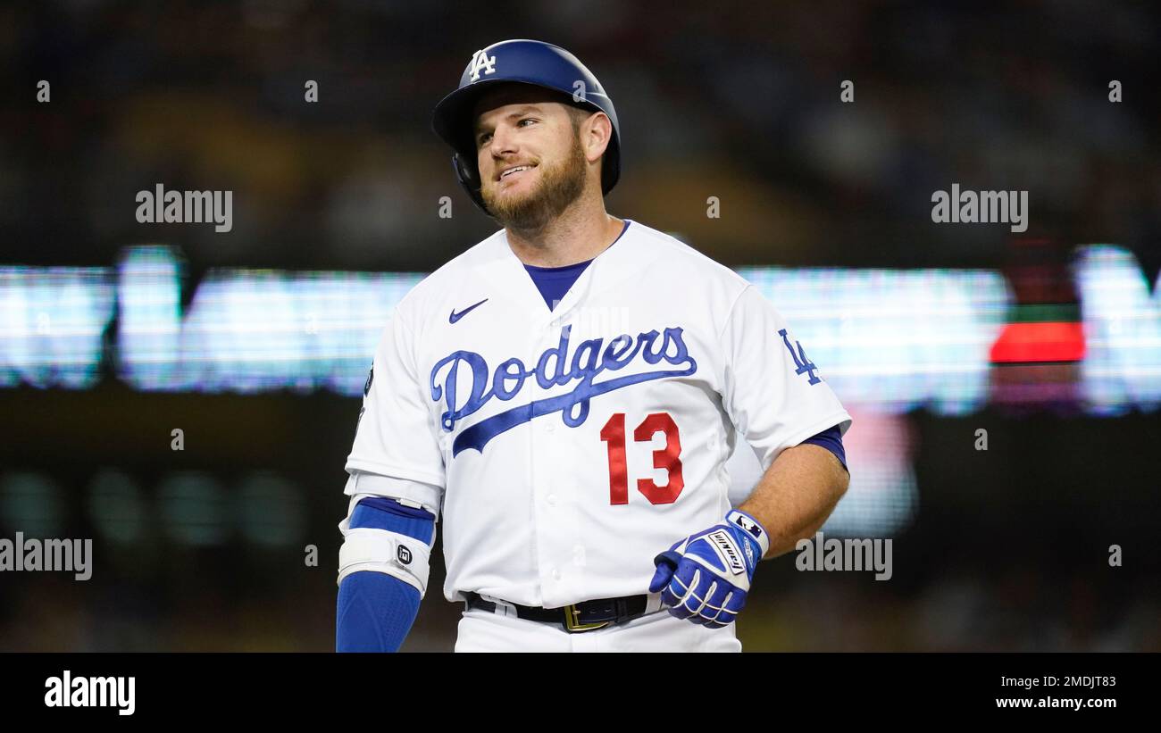 Los Angeles Dodgers' Max Muncy reacts after flying out during a ...