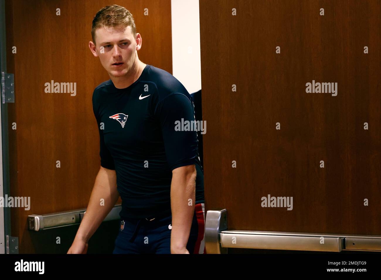 New England Patriots quarterback Mac Jones arrives for a news ...