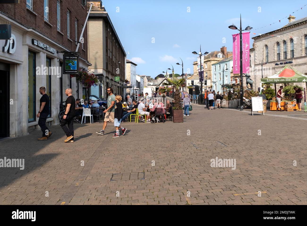 People in the historic Lemon Quay in Truro City centre in Cornwall in ...