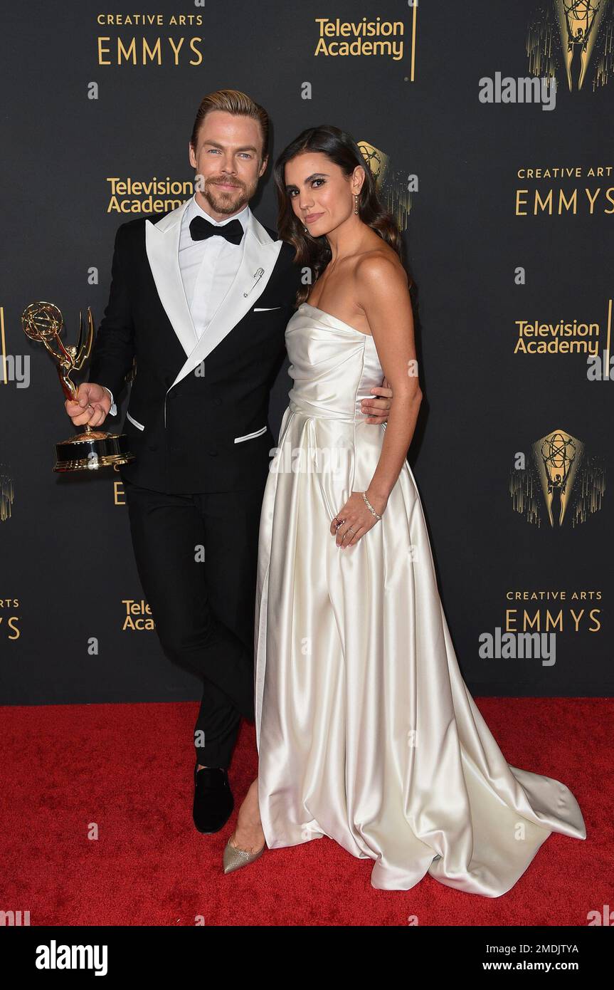 Derek Hough, left and Hayley Erbert pose with the award for outstanding ...