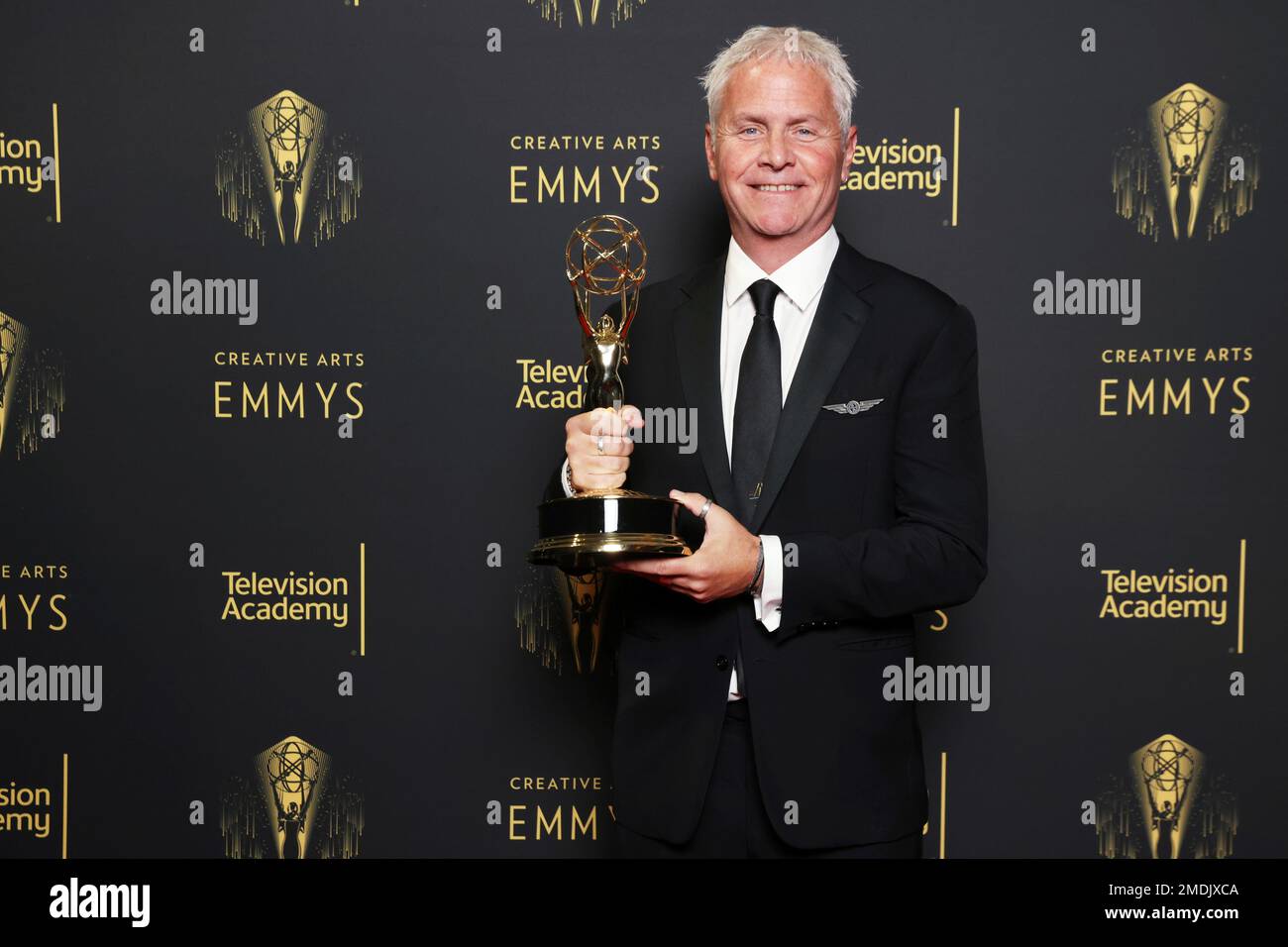 Blake Neely, winner of the Emmy for outstanding main title theme music ...