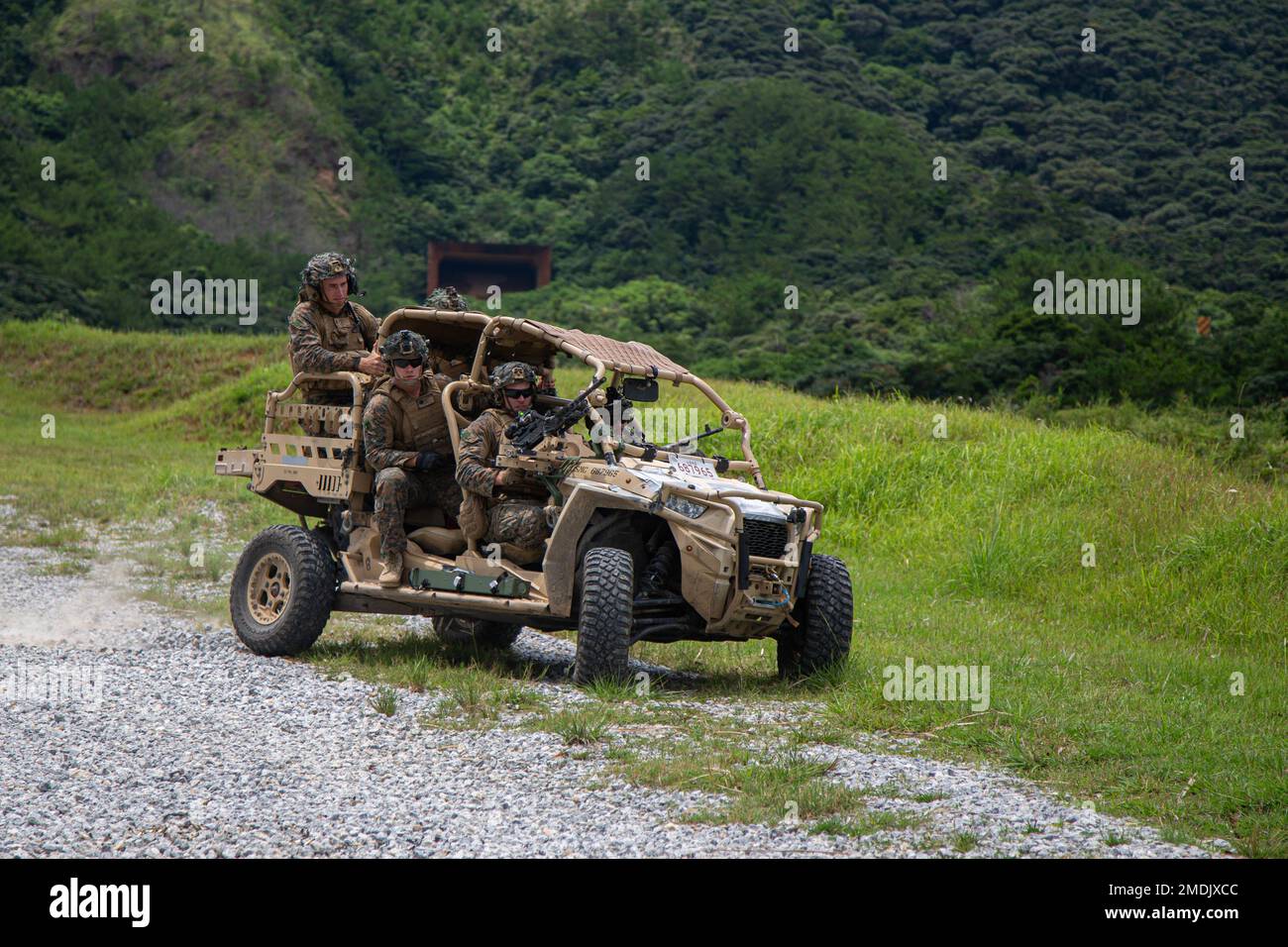 U.S. Marines with 3d Battalion, 2d Marines ride in a Utility Task ...
