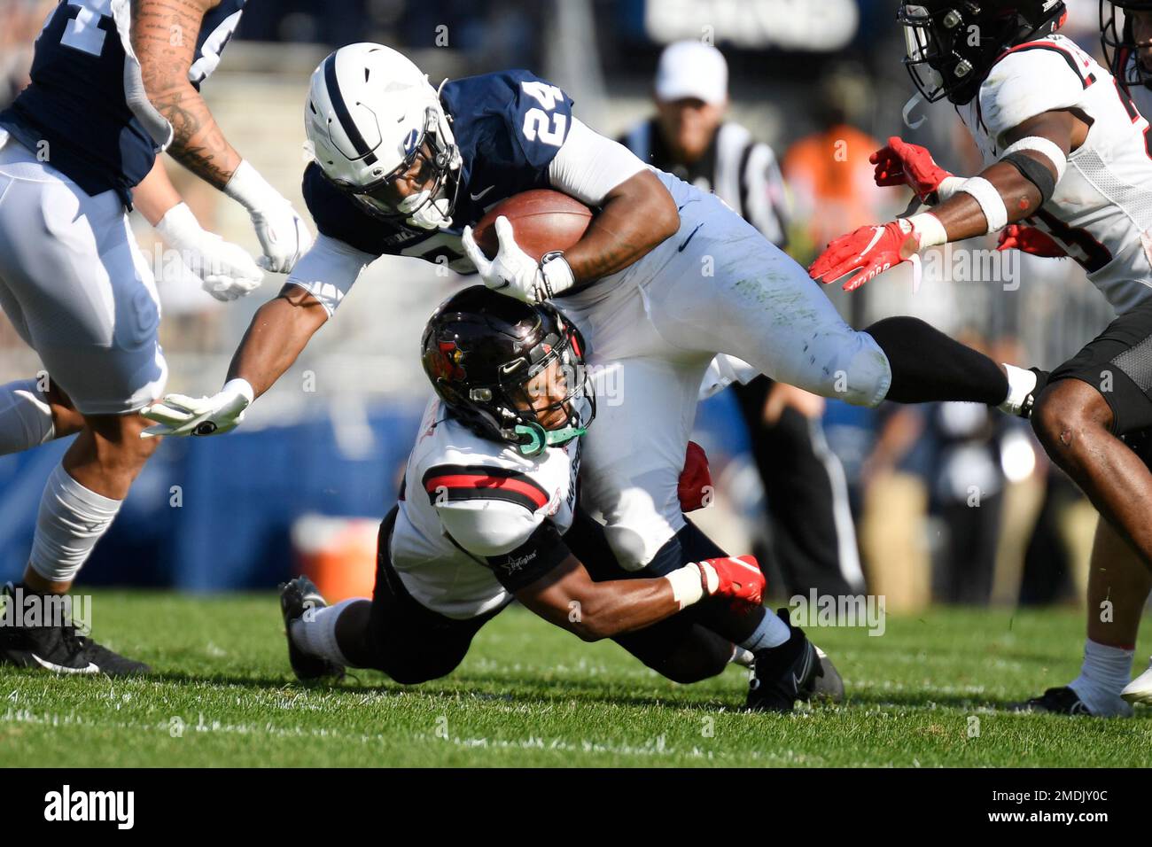 Penn State running back Keyvone Lee (24) is tackled by Ball State ...