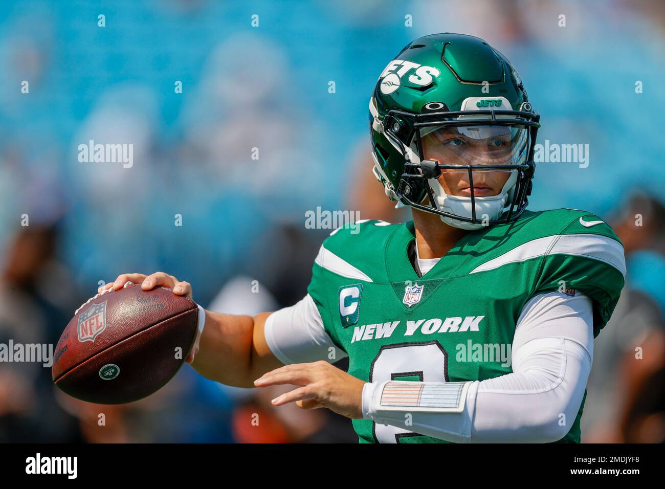 New York Jets quarterback Zach Wilson throws a pass before an NFL ...