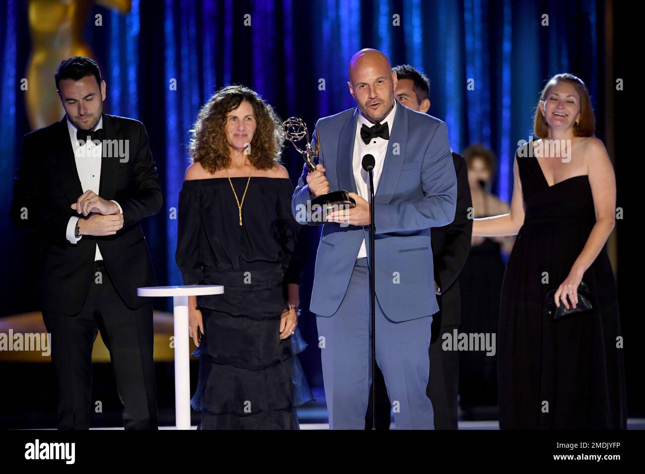 Ben Winston, Eric Pankowski, and David Young accept the award for ...