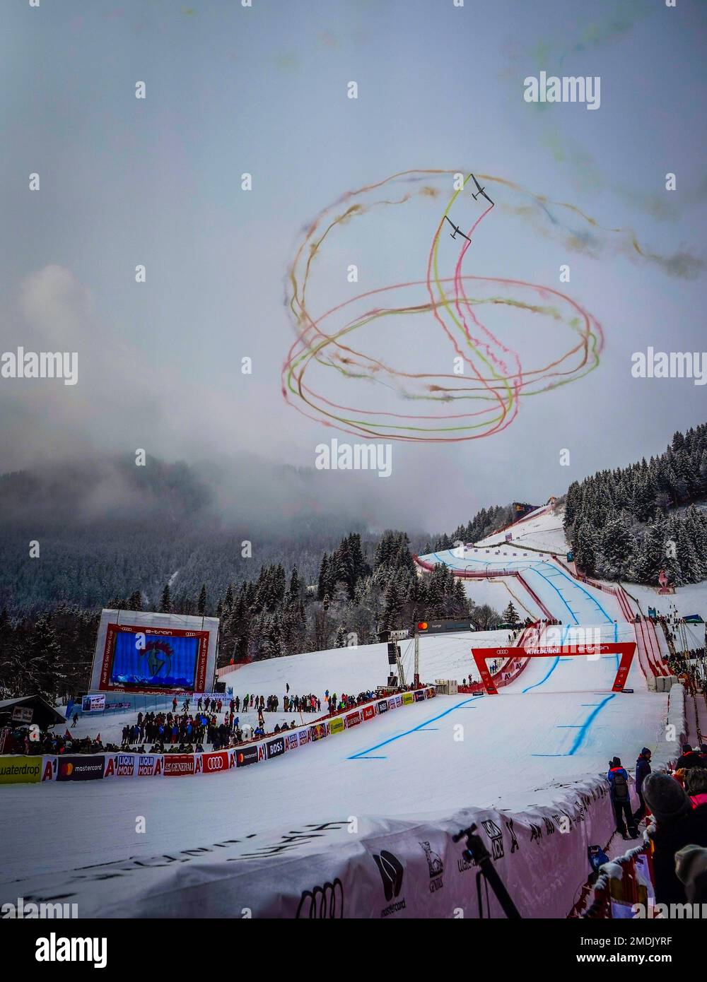 Kitzbühel, Austria 20230120.Gliders with colour display in the sky ...
