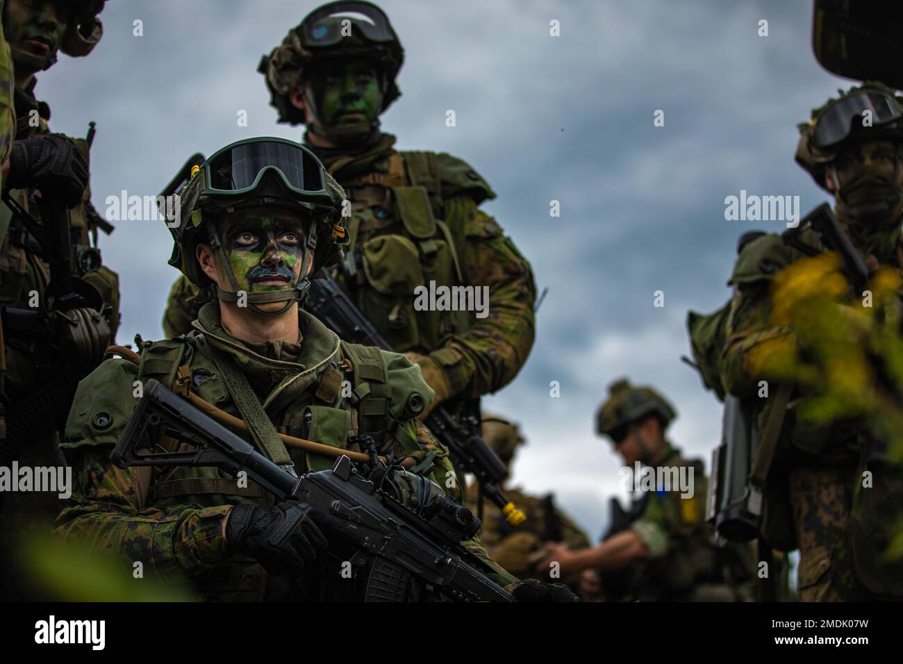 Finnish soldiers with the Satakunta Jaeger Battalion listen to a safety ...