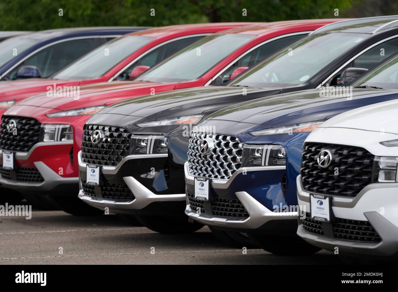 A lone line of 2022 Santa Fe sports-utility sit outside a Hyundai ...