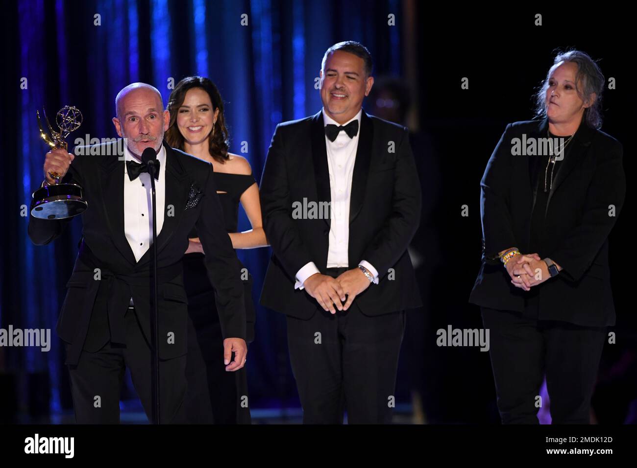 Rob Eric, from left, Jordana Hochman, Mark Bracero and Jennifer Lane accept the Emmy for ...