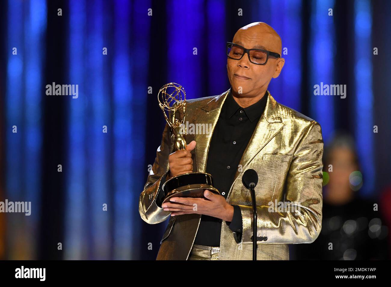 RuPaul accepts the Emmy for outstanding host for a reality or ...