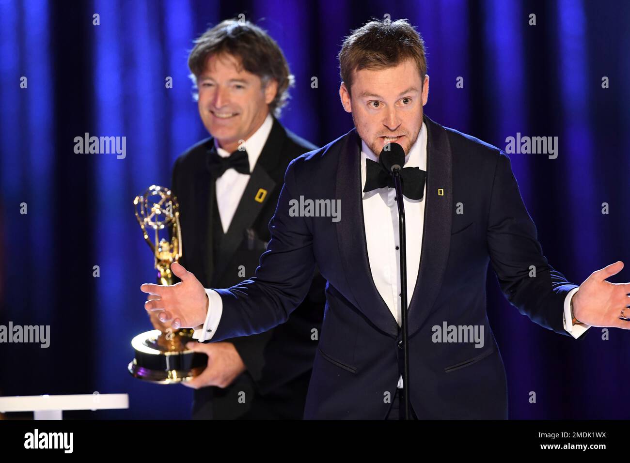 Tom Day, left, and Michael Cheeseman accept the Emmy for outstanding ...