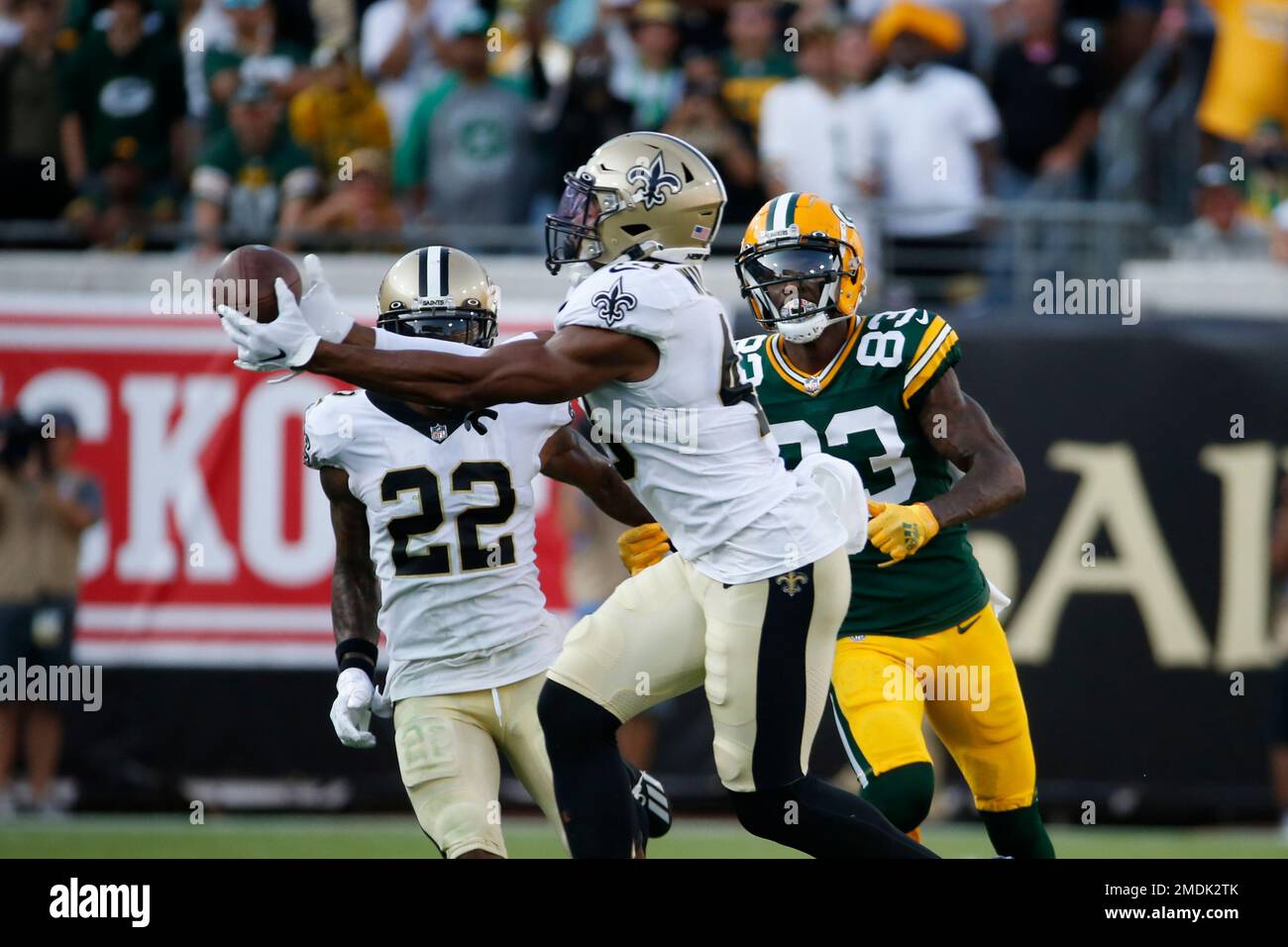 New Orleans Saints free safety Marcus Williams, left, intercepts a pass ...