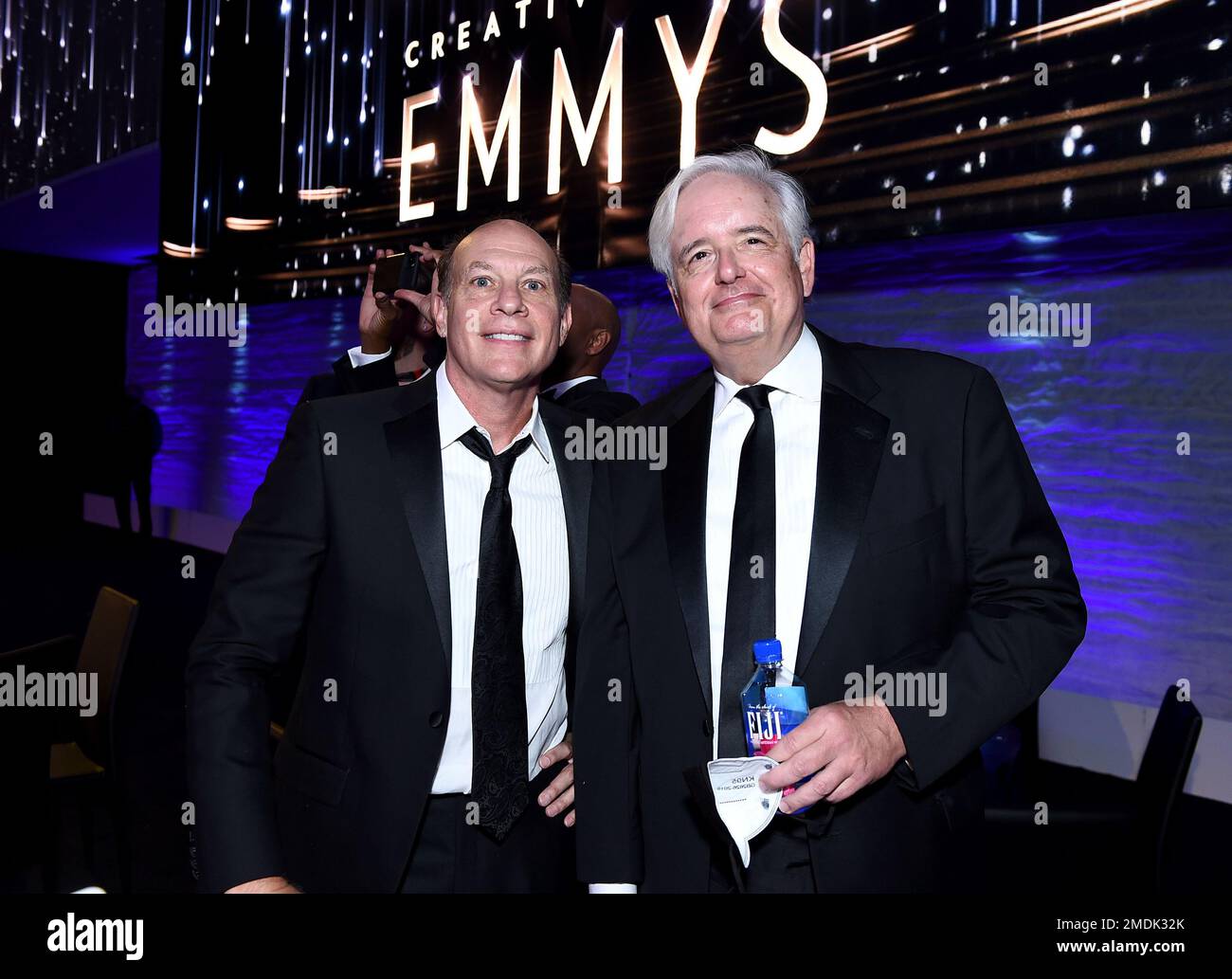 Brian Miller, left, and Keith Crofford attend the second ceremony of ...