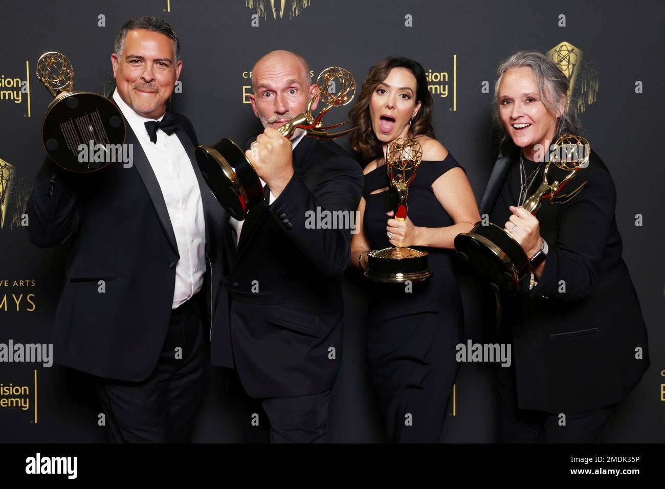 Mark Bracero, from left, Rob Eric, Jordana Hochman and Jennifer Lane, winners of the Emmy for ...