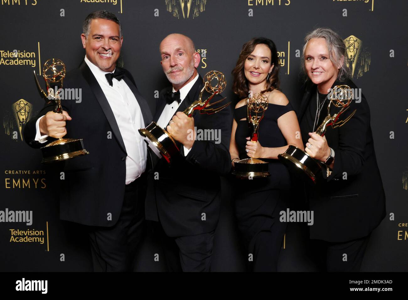 Mark Bracero, from left, Rob Eric, Jordana Hochman and Jennifer Lane, winners of the Emmy for ...