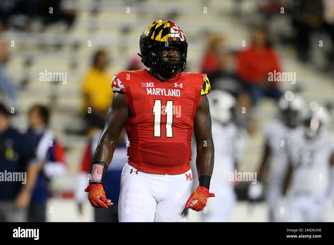 Maryland linebacker Ruben Hyppolite II (11) looks on during the first ...