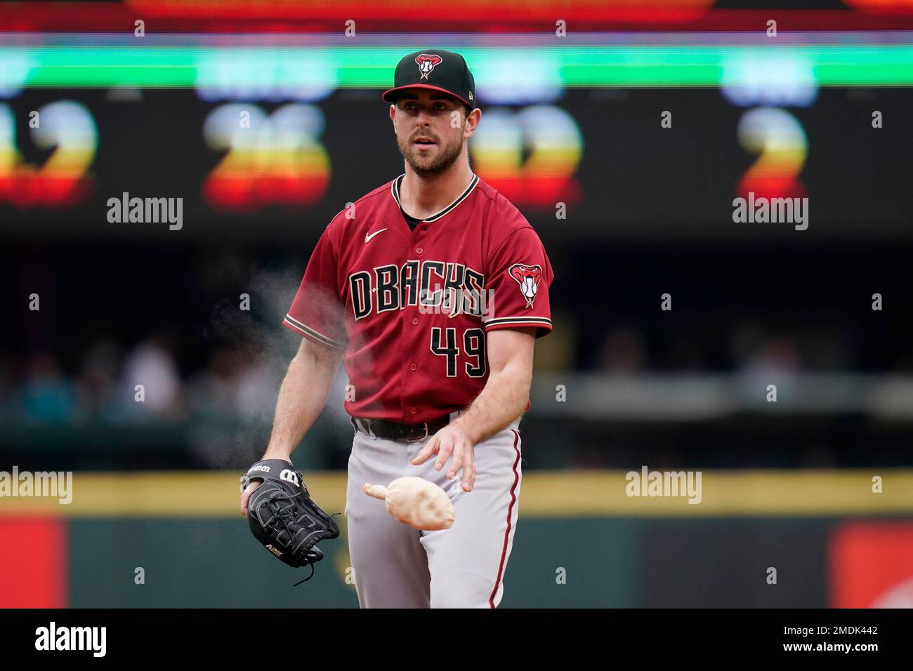 Arizona Diamondbacks starting pitcher Tyler Gilbert stands on the mound ...