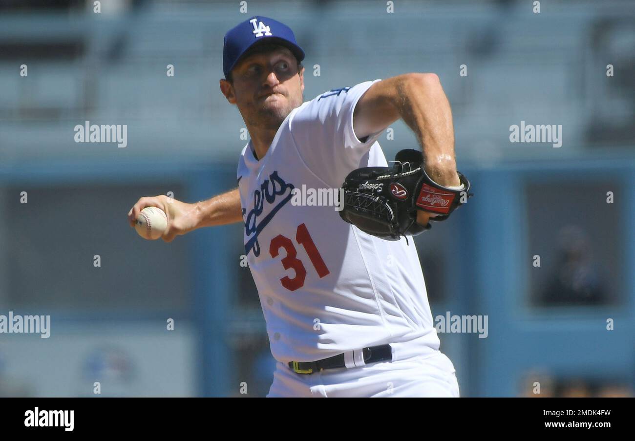 Los Angeles Dodgers starting pitcher Max Scherzer throws in the first ...