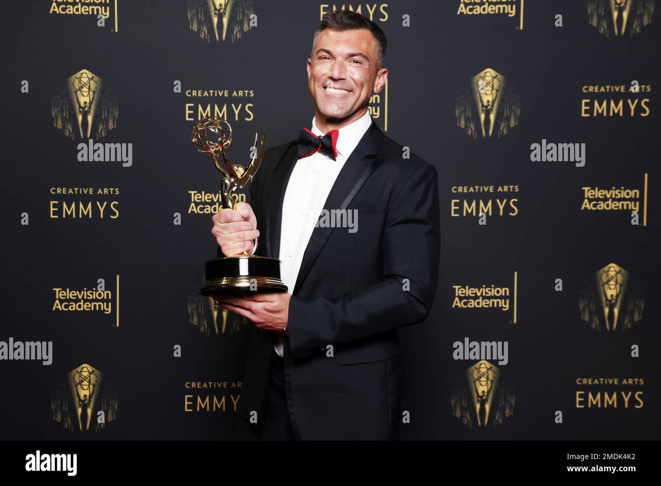 Ethan Petersen, winner of the award for outstanding casting for a ...