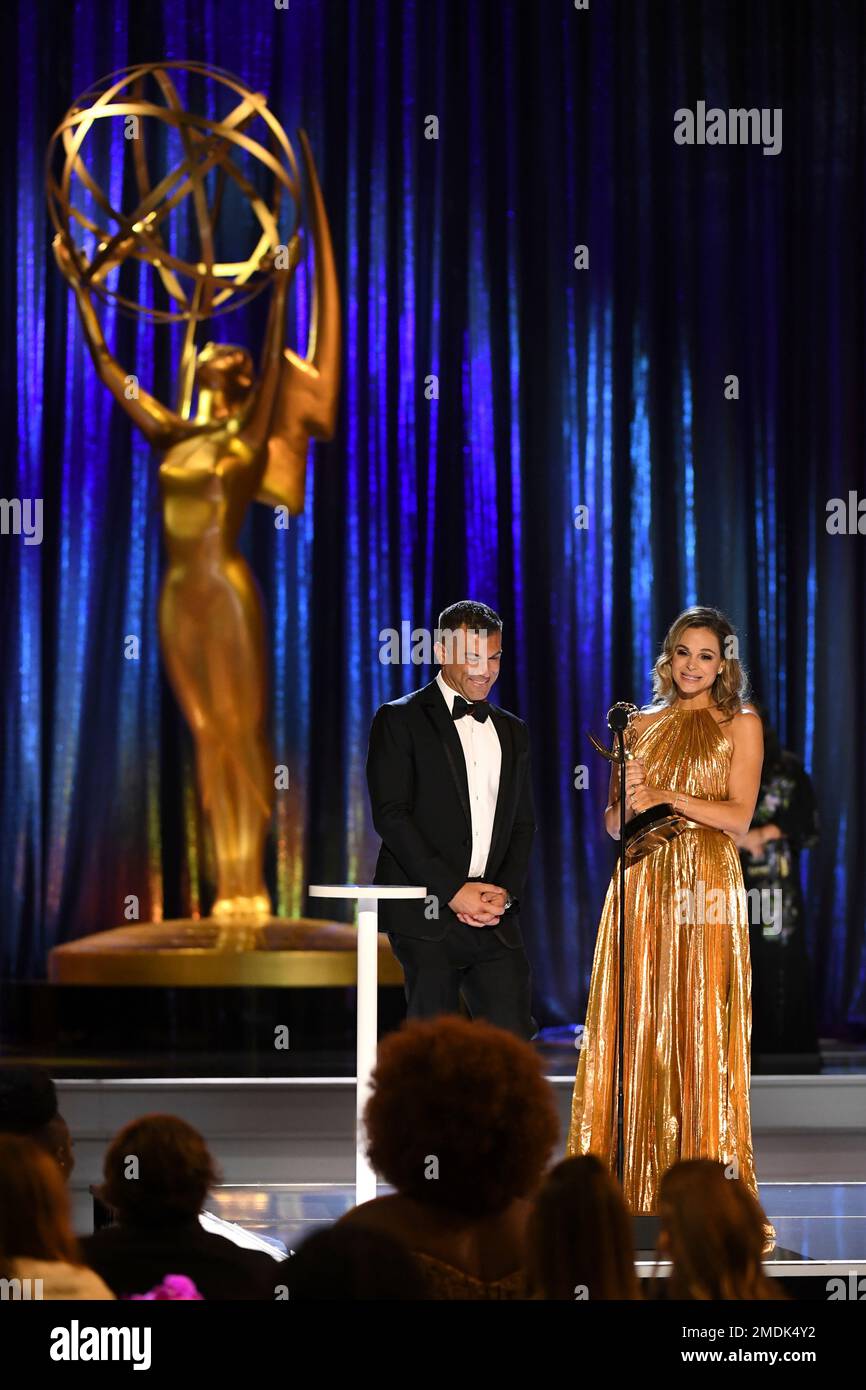Ethan Petersen, left, and Goloka Bolte accept the award for outstanding ...