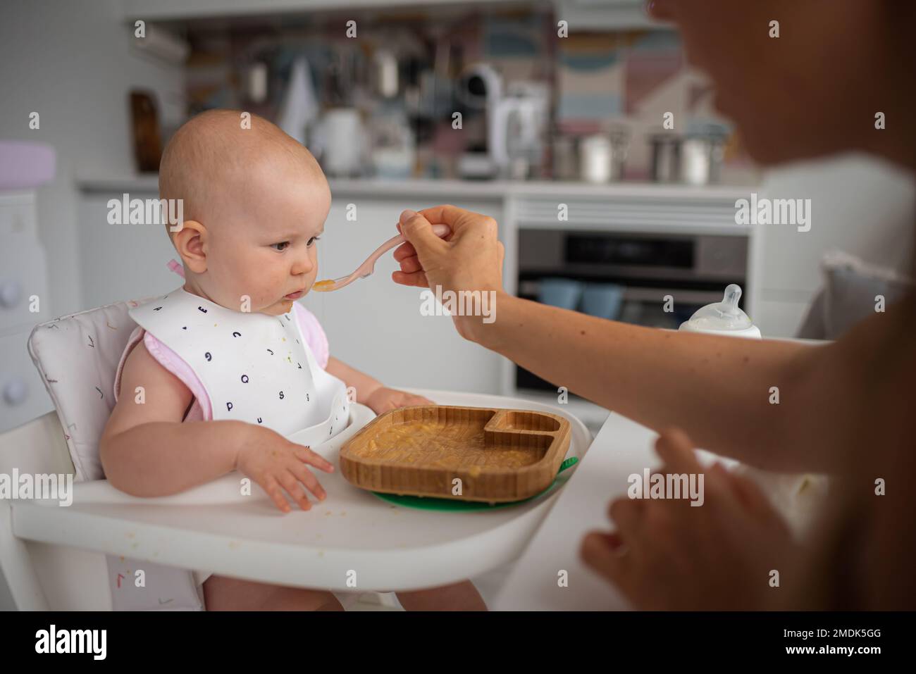 first feeding of the child, the child refuses to eat Stock Photo - Alamy