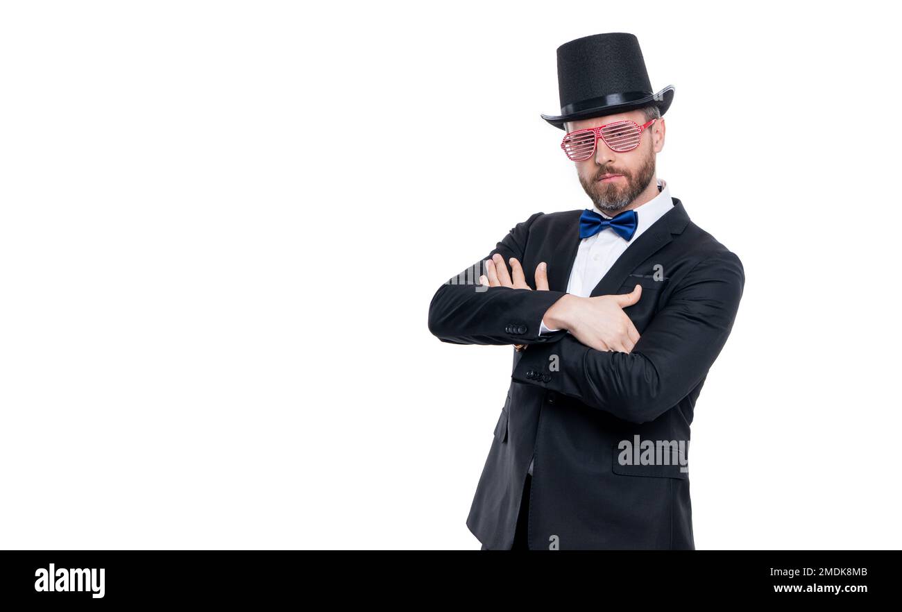 partygoer showman wear tuxedo in studio with copy space. showman ...