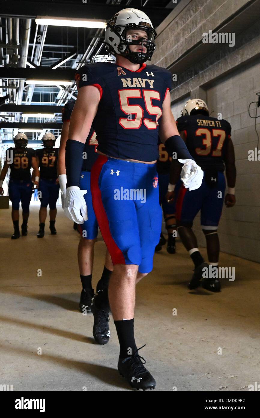 Navy linebacker John Kelly III (55) walks through the tunnel before an ...