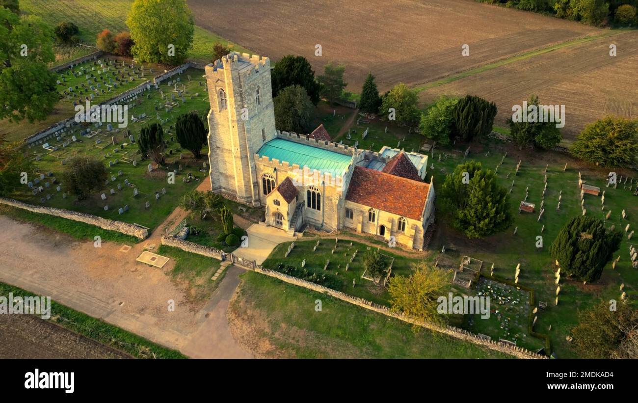 An aerial view of a village church with graveyard Stock Photo - Alamy