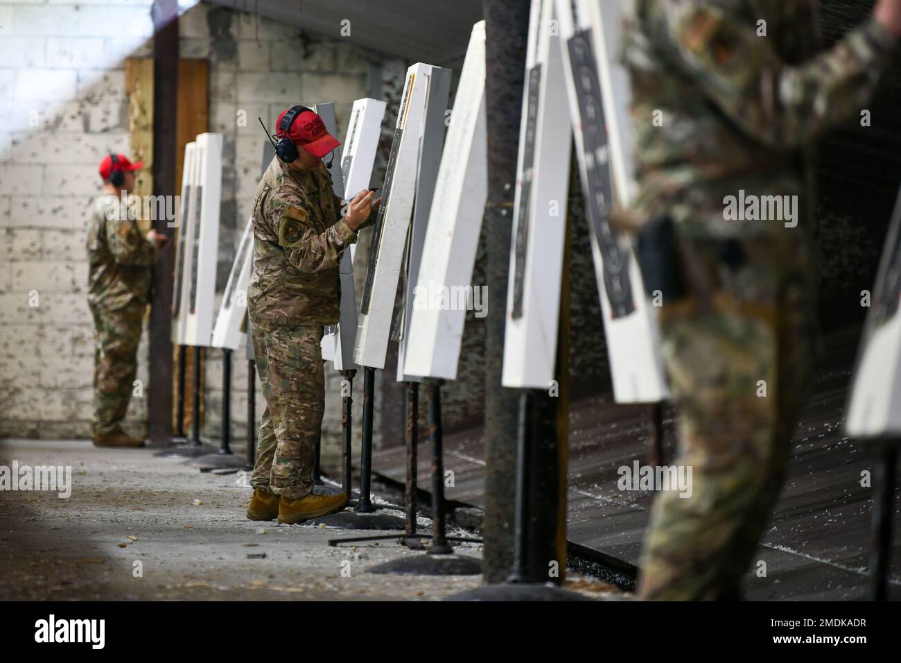 U.S. Air Force Combat Arms Training and Maintenance instructors record ...