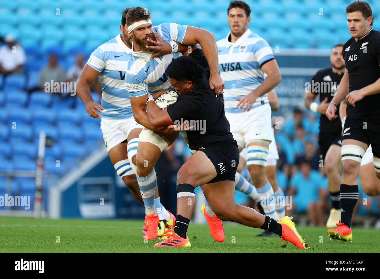Argentina's Marcos Kremer, left, tackles New Zealand's Asafo Aumua ...