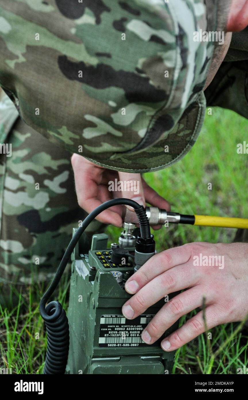 Spc. Gavin Herring, an Information Technology specialist with the 350th ...