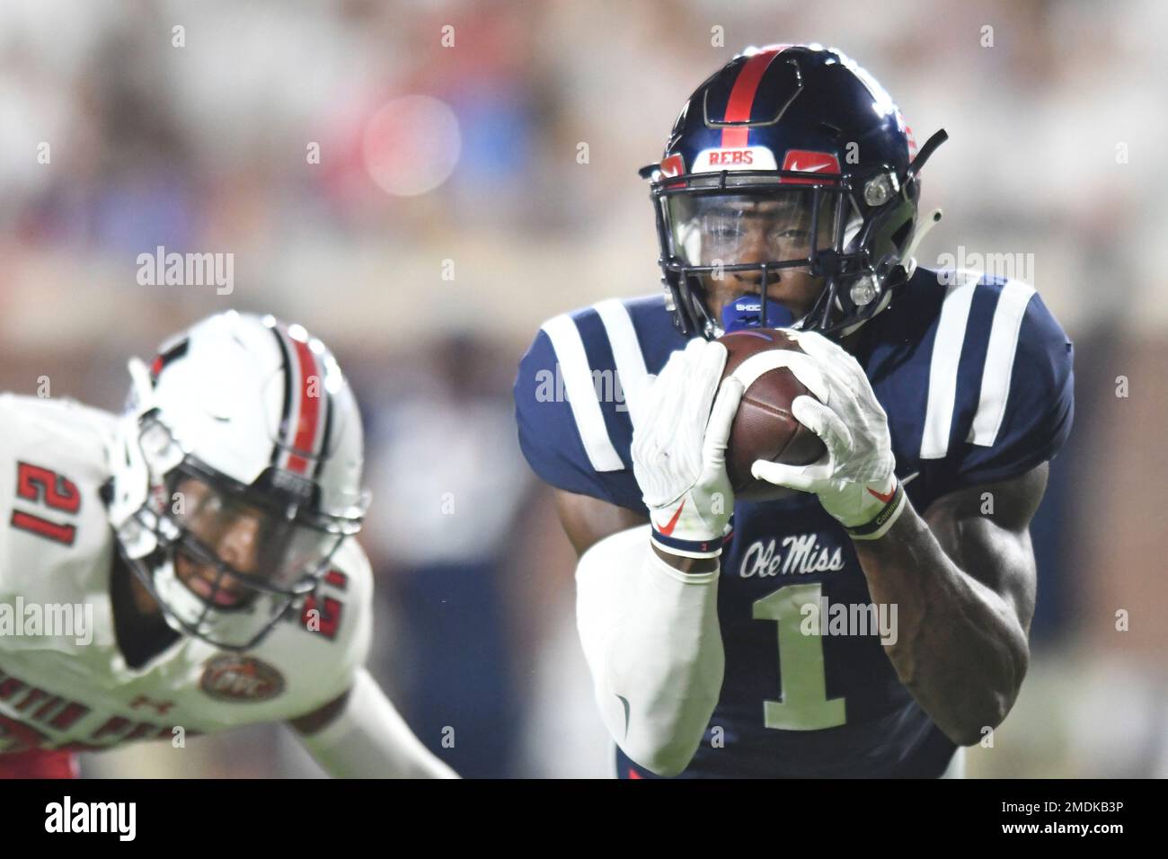 Mississippi wide receiver Jonathan Mingo (1) is unable to hold onto a ...