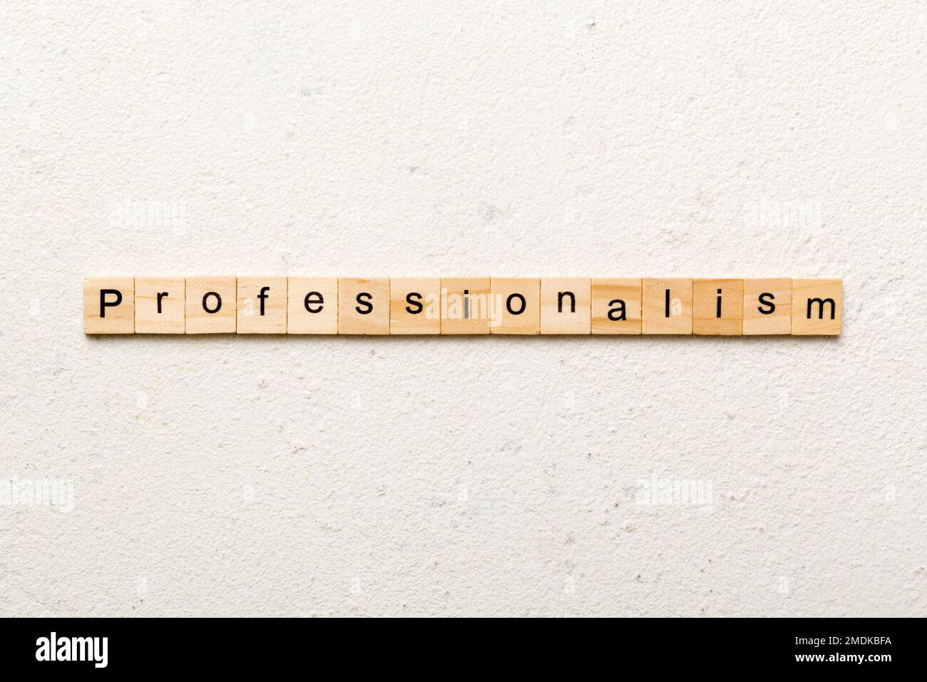 Professionalism word written on wood block. Professionalism text on ...