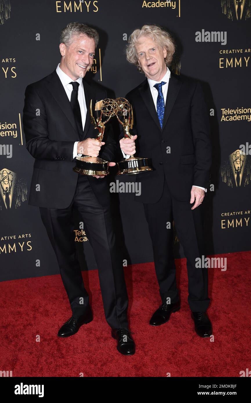 Keith Cunningham and Edward McLoughlin pose for a portrait with their ...