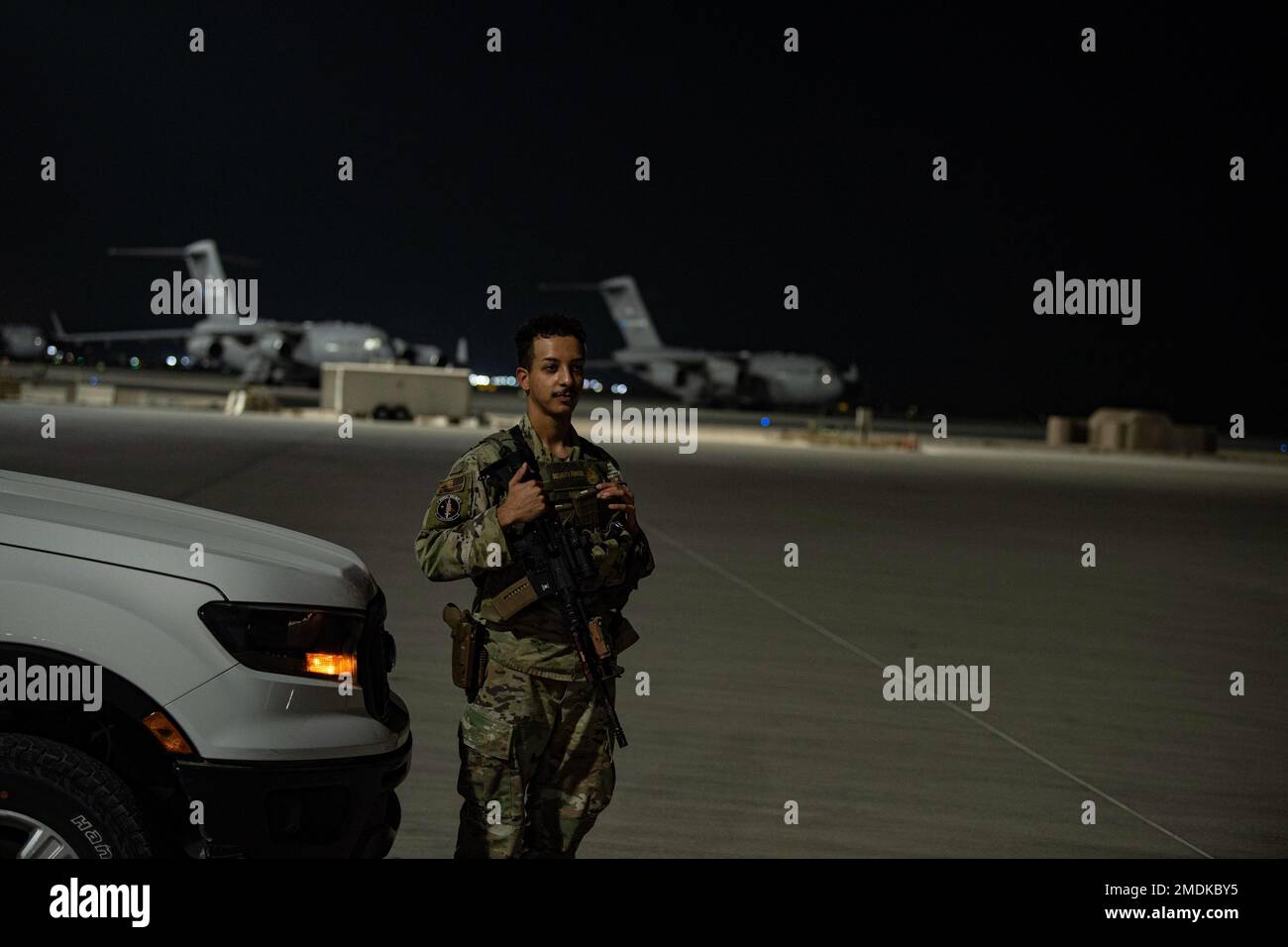 U.S. Air Force Senior Airman David Molina, 379th Expeditionary Security ...