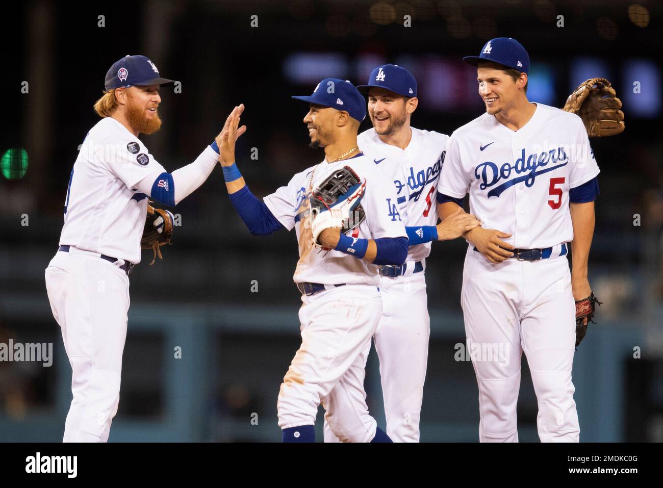 Los Angeles Dodgers third baseman Justin Turner, right fielder Mookie ...