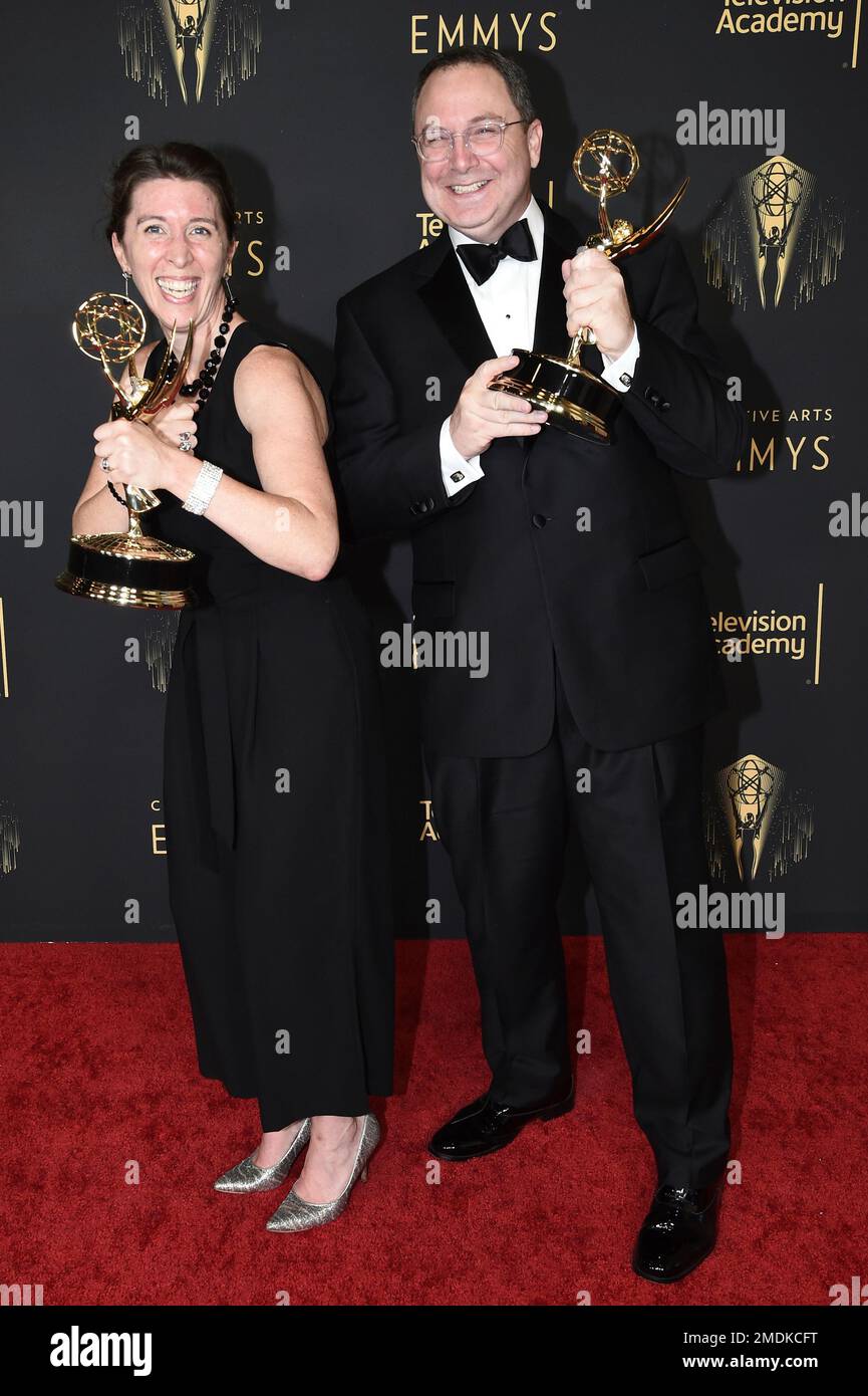 Alana Billingsley and Joe Celli pose for a portrait with their awards ...