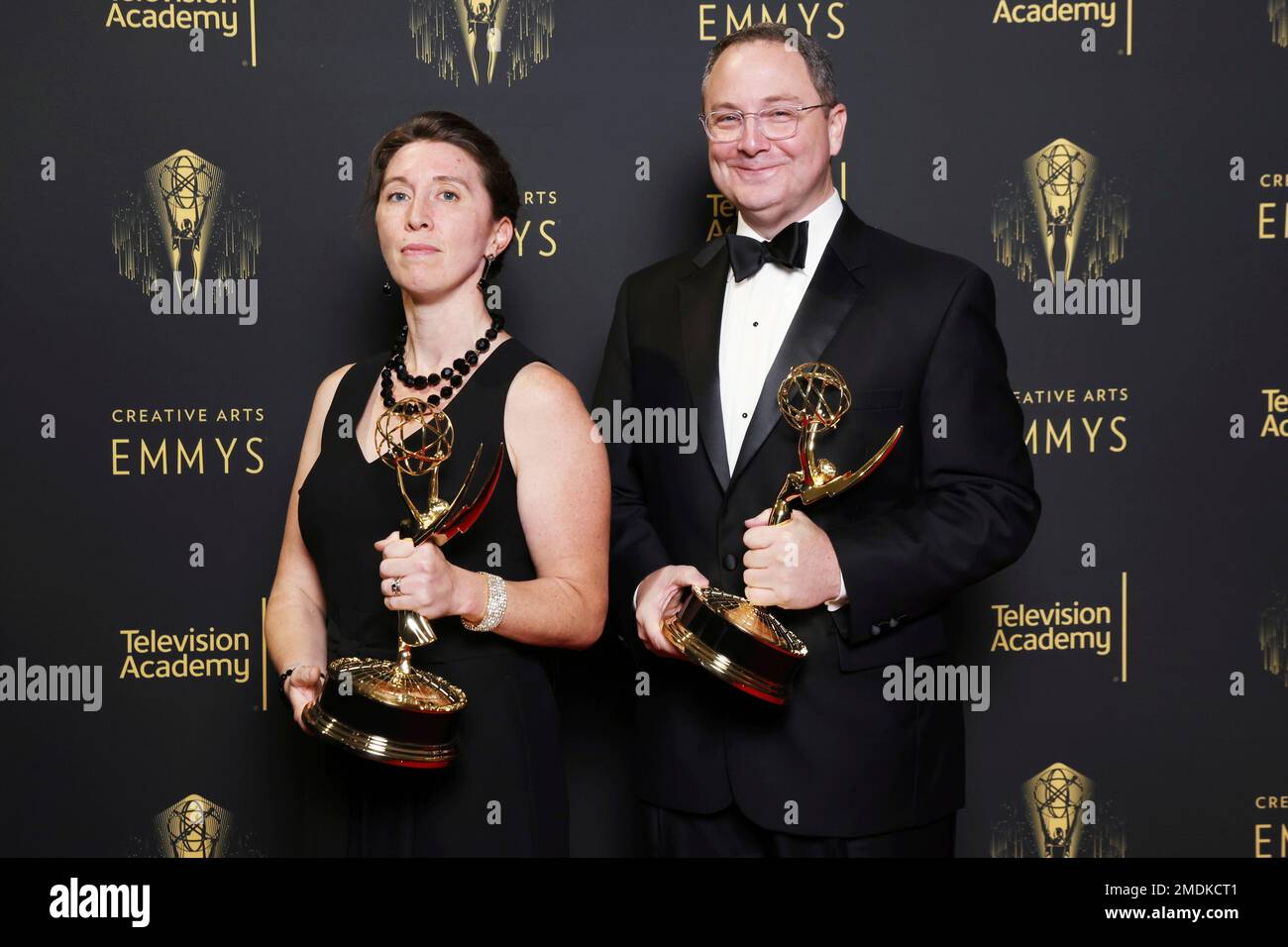 Alana Billingsley and Joe Celli pose for a portrait with their awards ...