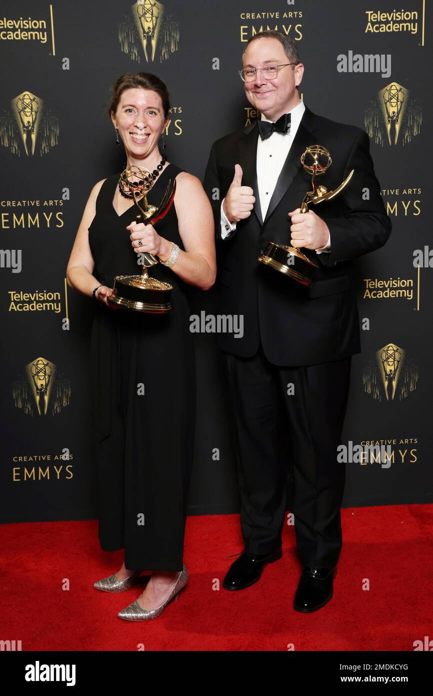 Alana Billingsley and Joe Celli pose for a portrait with their awards ...