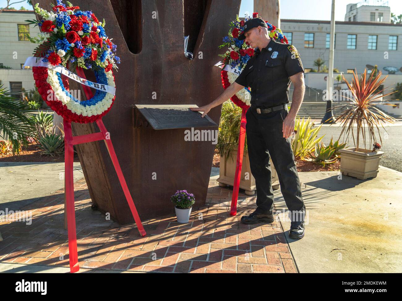 Los Angeles Fire Capt. Erik Scott pays his respects at the World Trade ...