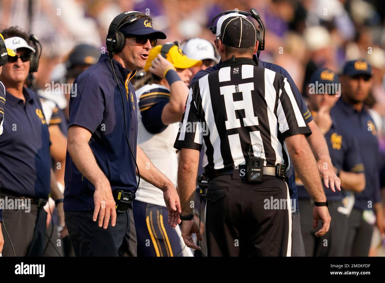 California head coach Justin Wilcox, left, speaks to an official during ...