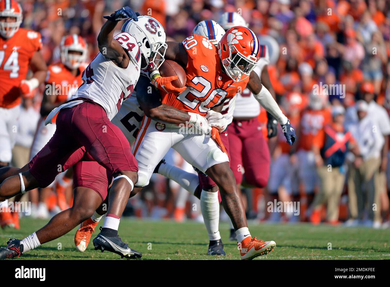 Clemson running back Kobe Pace (20) runs the ball in the first half of ...